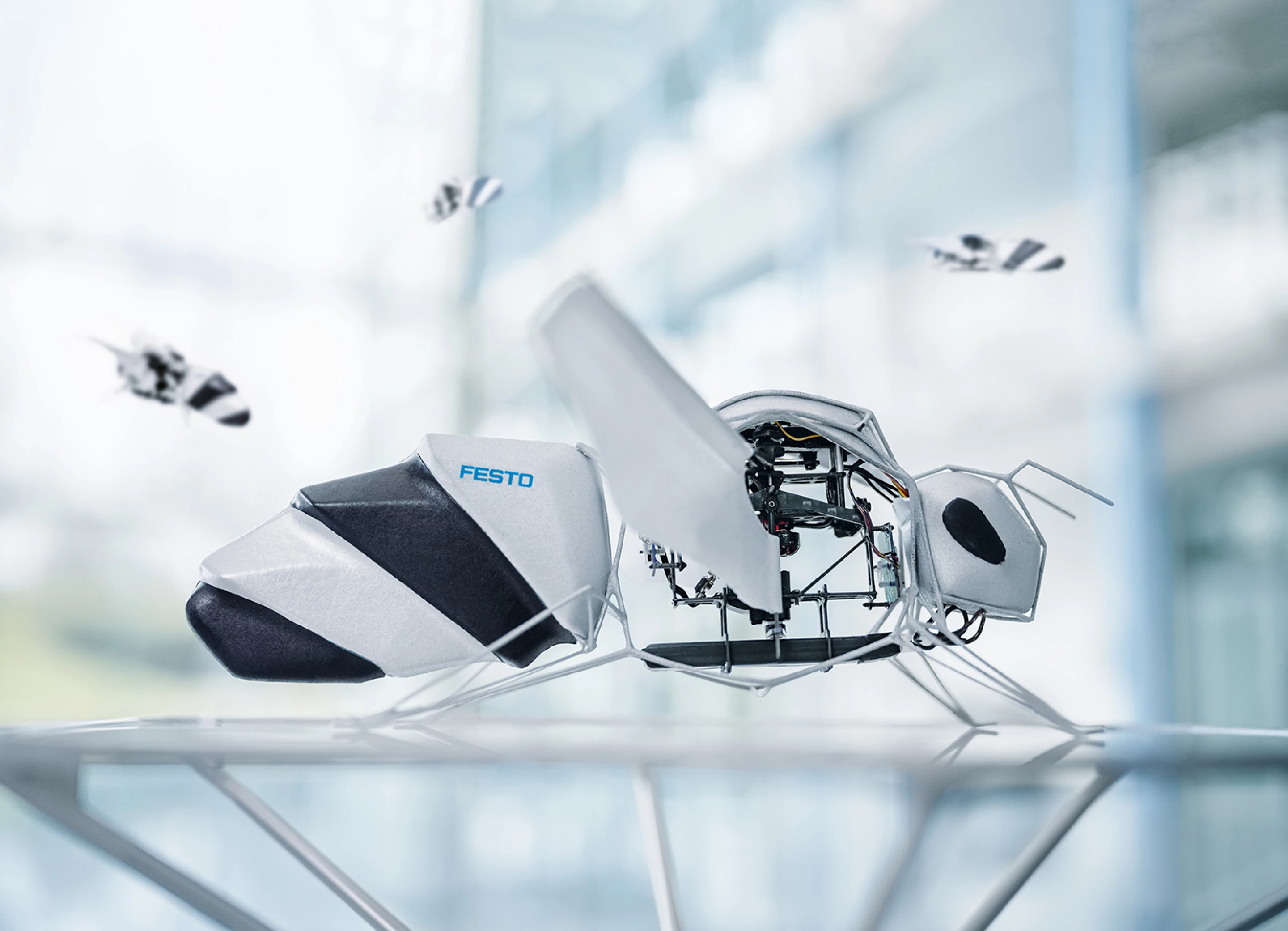 Robot bee swarms fly collision-free in close formation