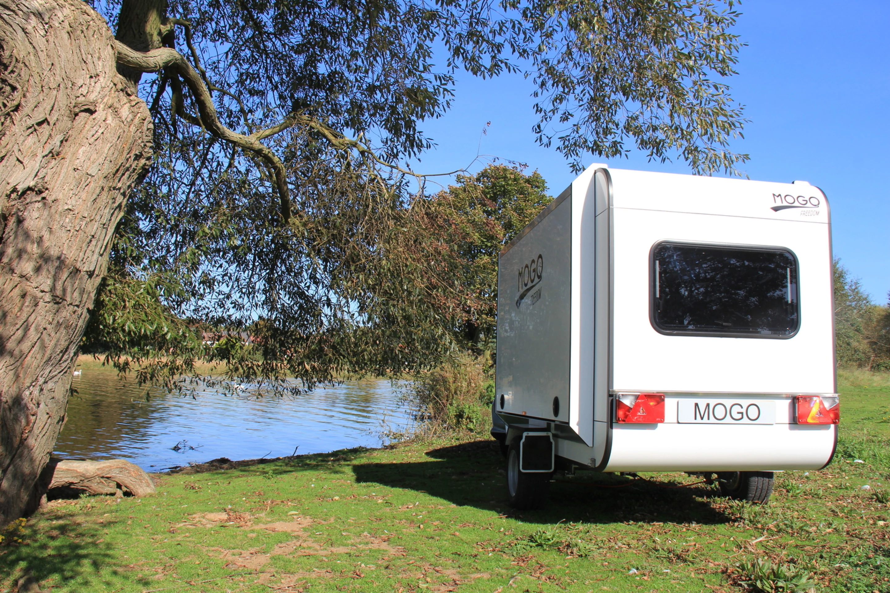 Mogo Freedom gullwing trailer hauls outdoor gear, sleeps two