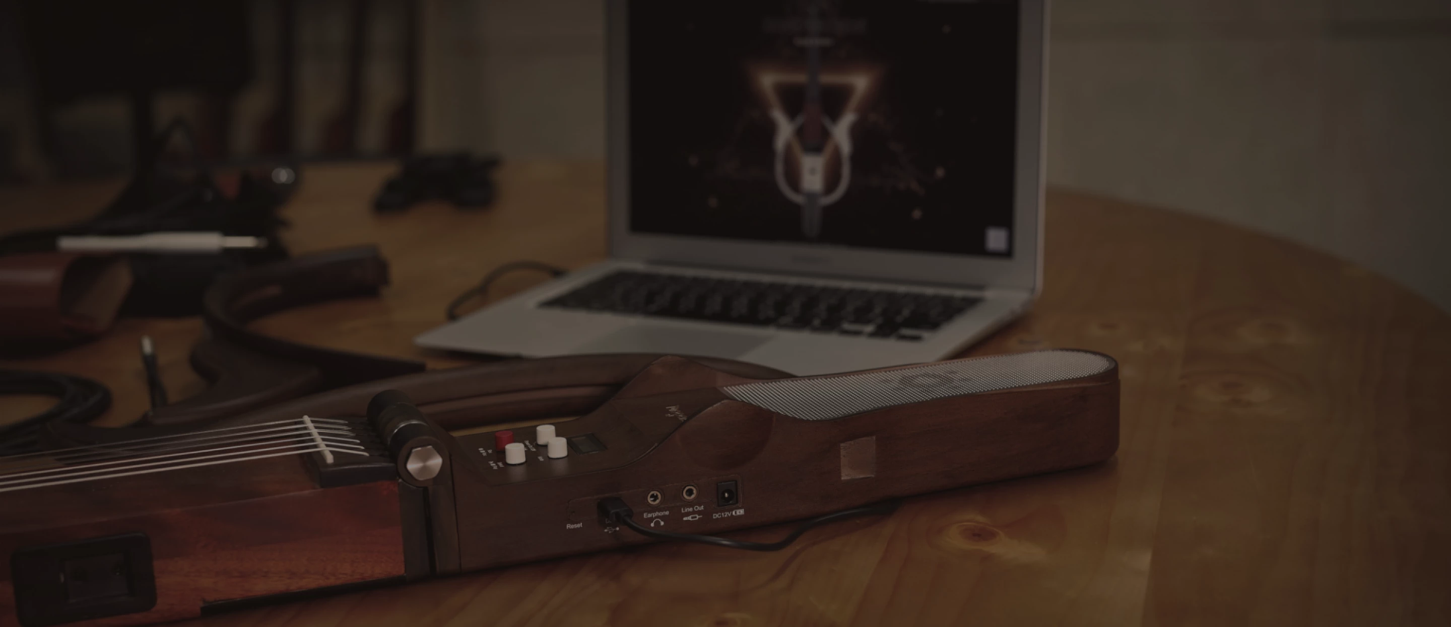 Folding travel guitar rocks onboard recording, built-in speaker and ...