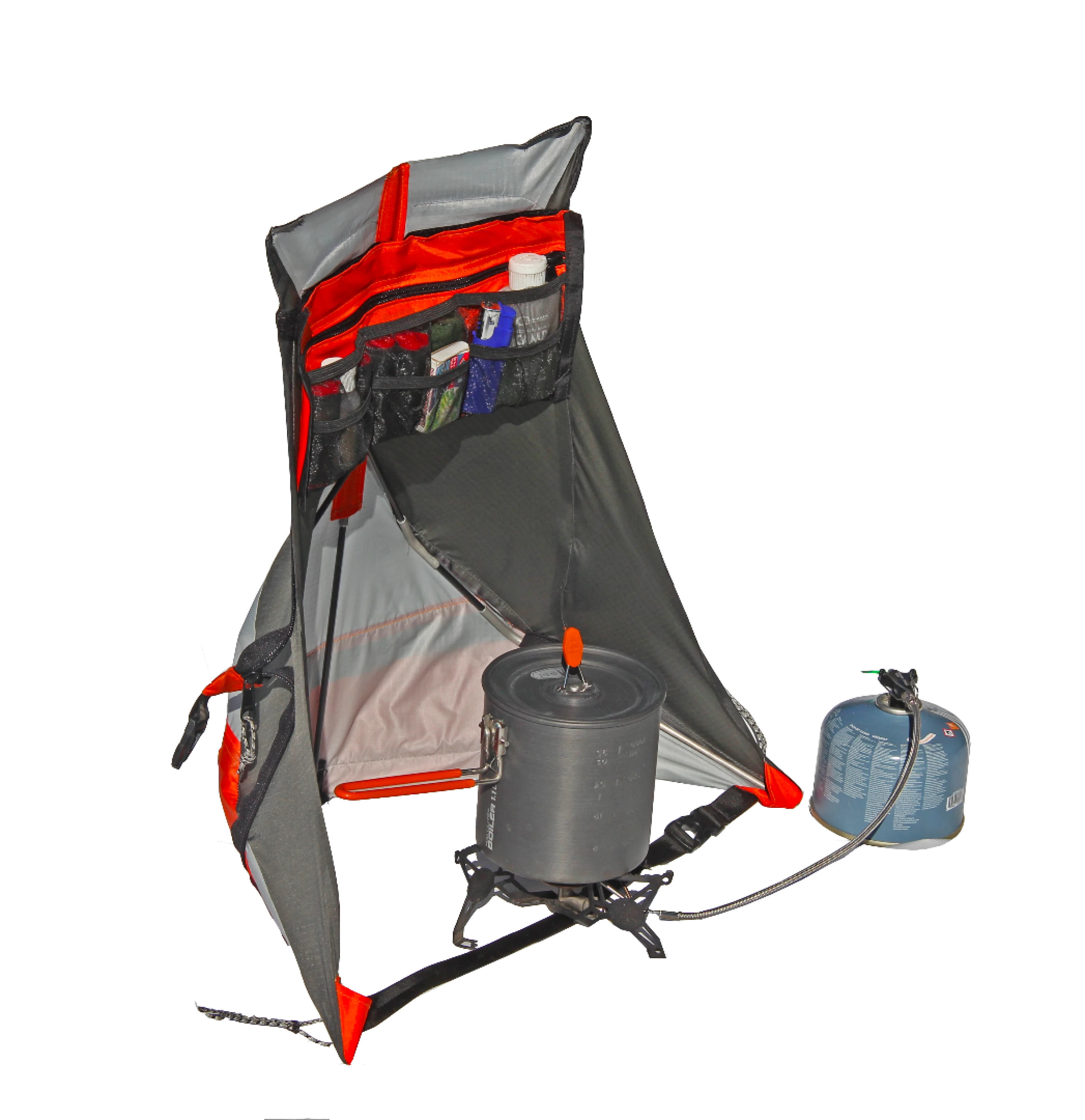 Back-packable organizer stores cooking gear and protects the flame