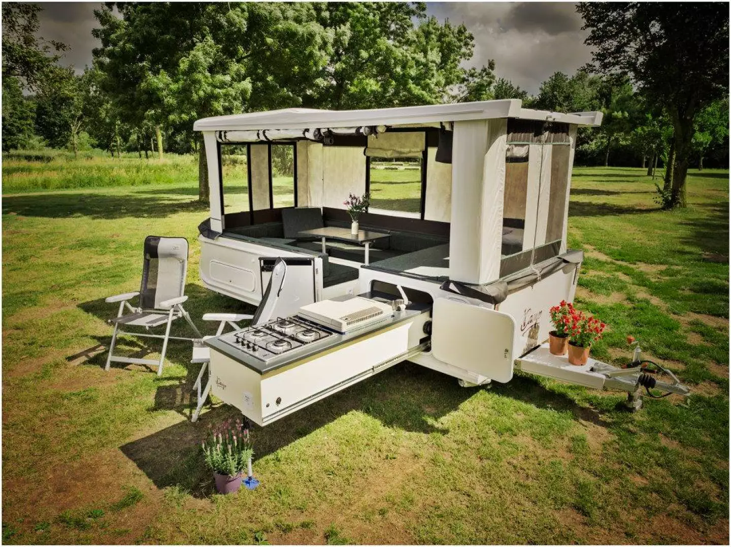 Remote-control pop-up camper tows like a sports car, grows into a ...