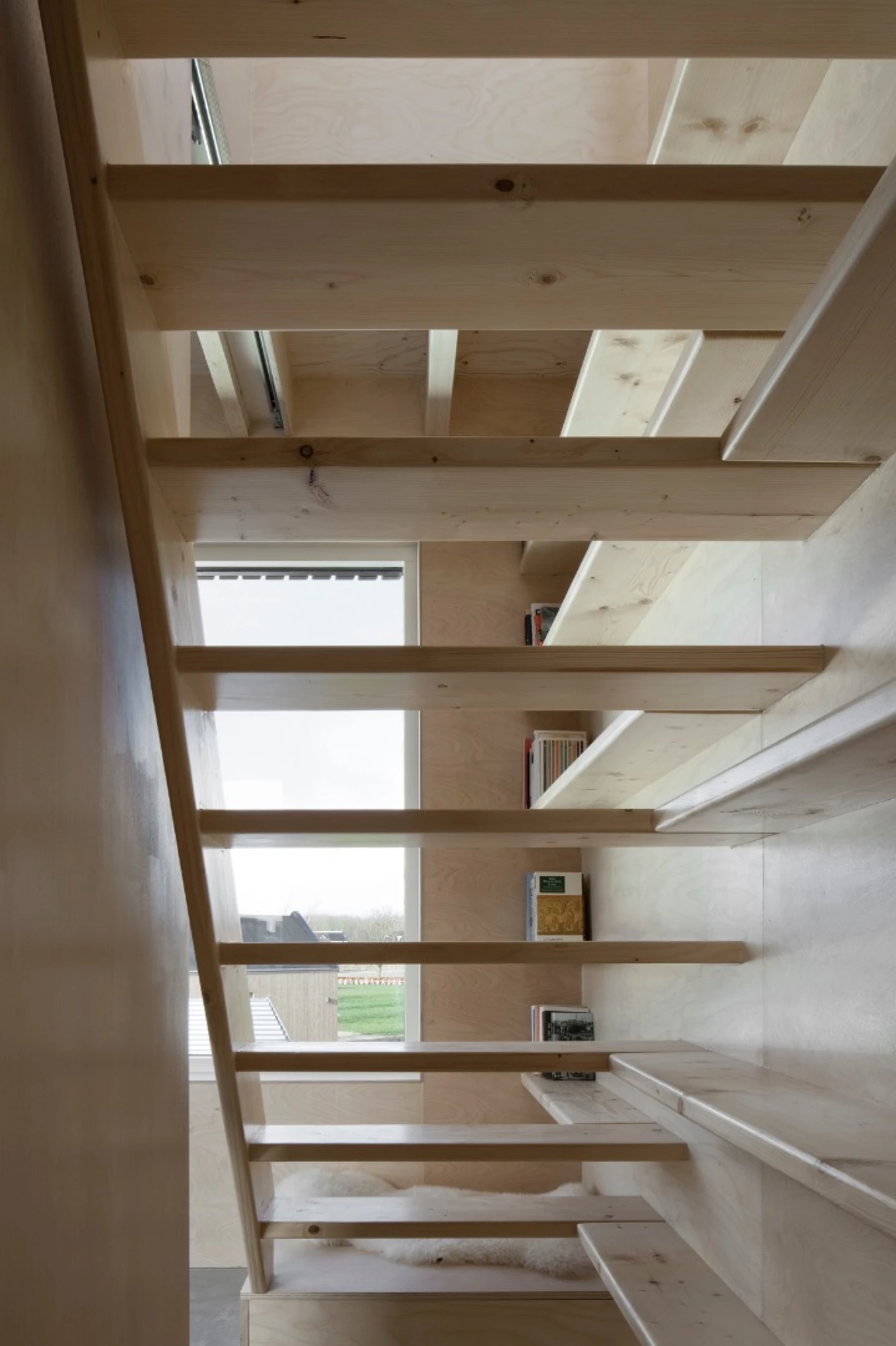 Skinny house is smaller than a couple of parking spaces