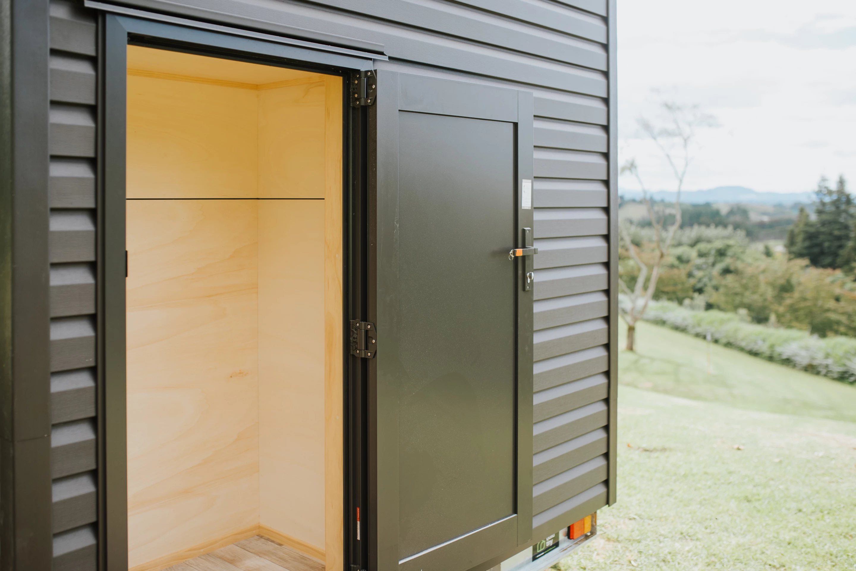 Nugget tiny house doubles up on staircases and storage space