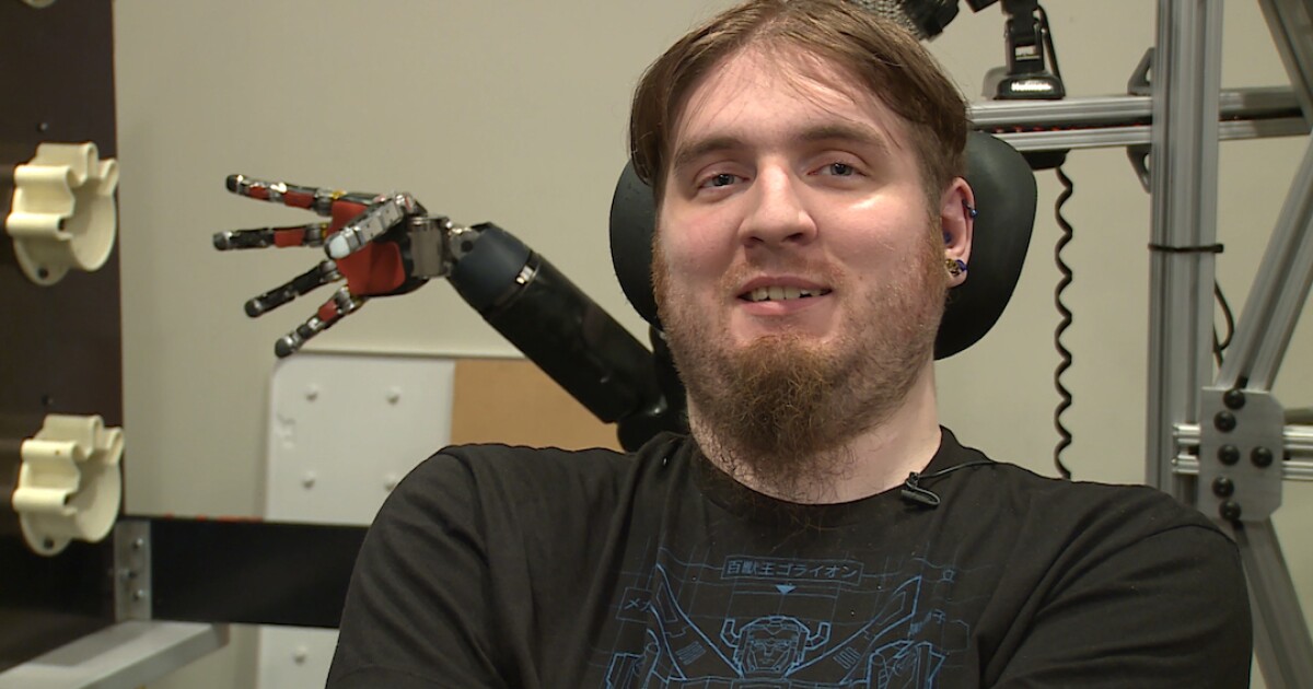 Robotic arm gives quadriplegic man a new sense of touch