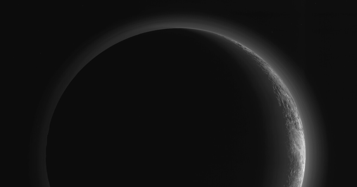 New Horizons captures incredible backlit photo of Pluto's crescent