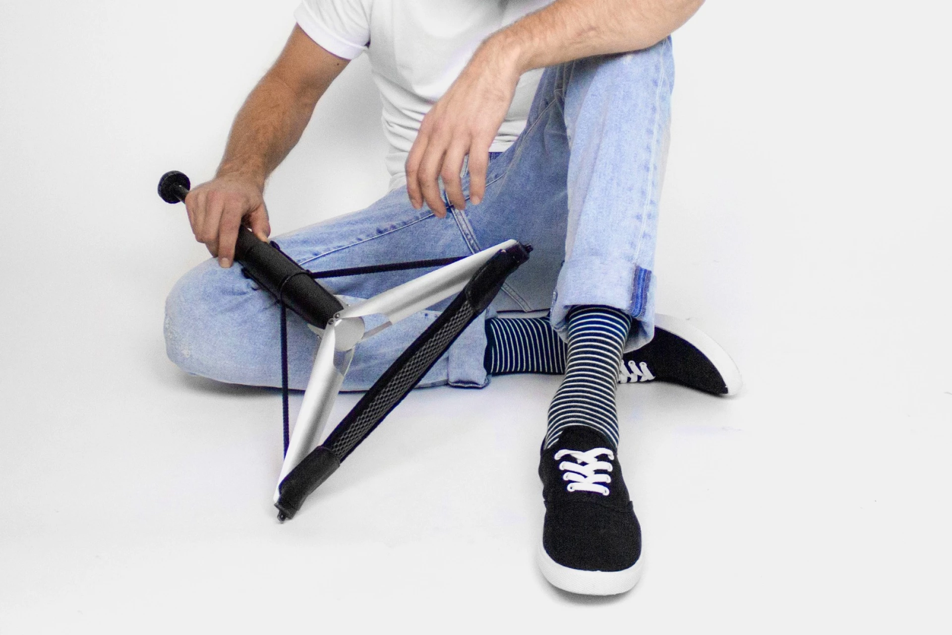 Sitpack collapsible stool takes the load off wherever you wander