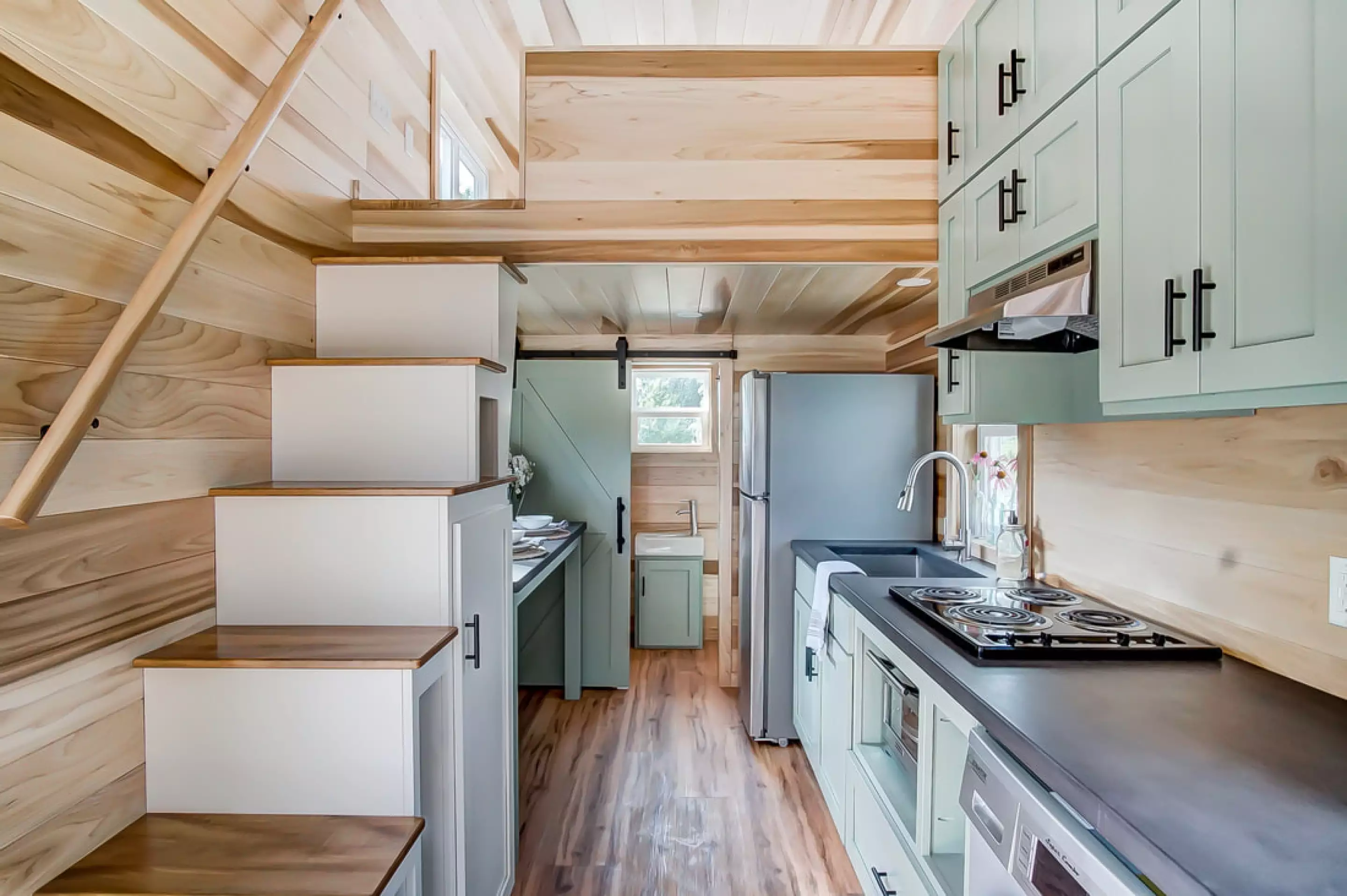 Spacious living room serves as social heart of Clover tiny house