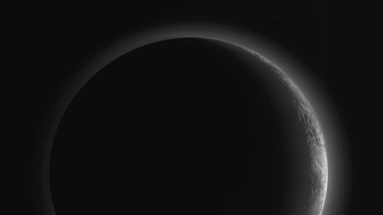 New Horizons captures incredible backlit photo of Pluto's crescent