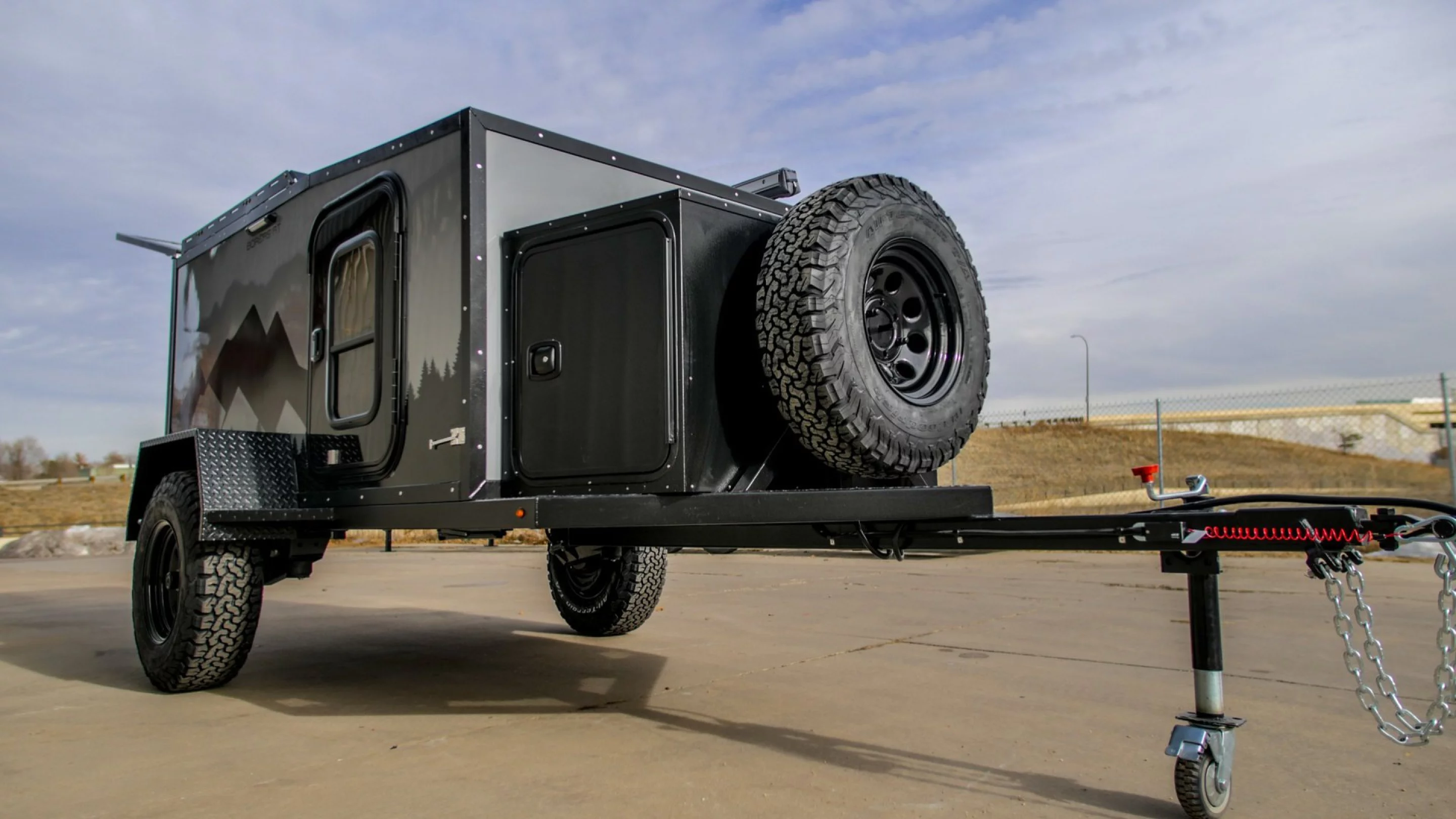 Boreas composite off-road camper trailer leaves the wood in the forest