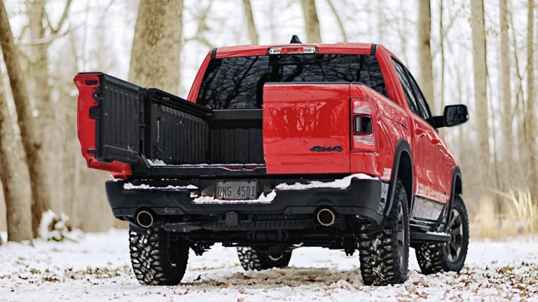 Ram 1500's new tailgate folds and swings for access with or without a ...