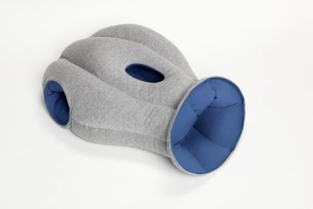 Ostrich pillow allows you to take naps almost anywhere – and now you ...