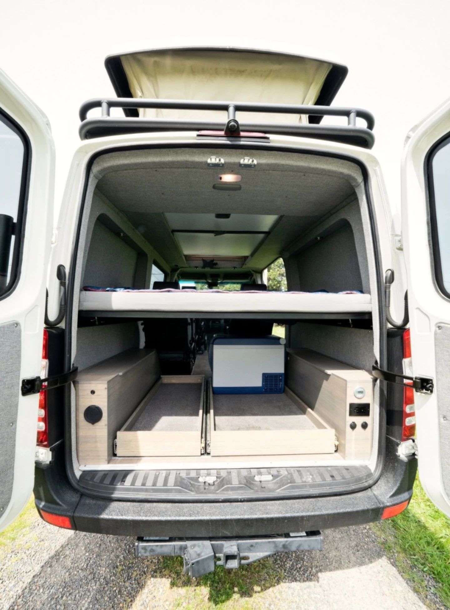 Swiss Army Sprinter camper van packs five people, solar power and ...