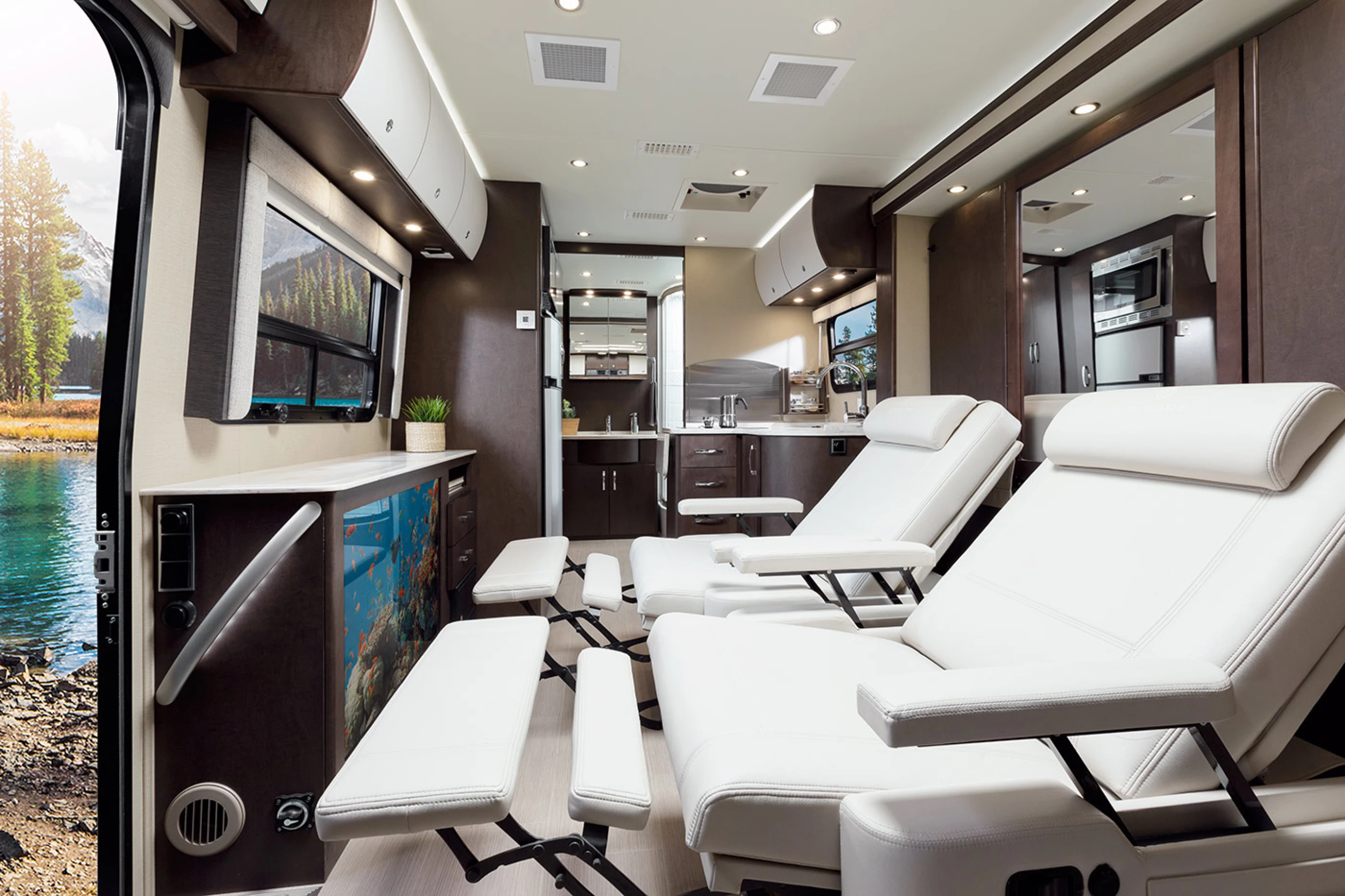 Unity motorhome combines Murphy bed and swivel recliners in comfy ...