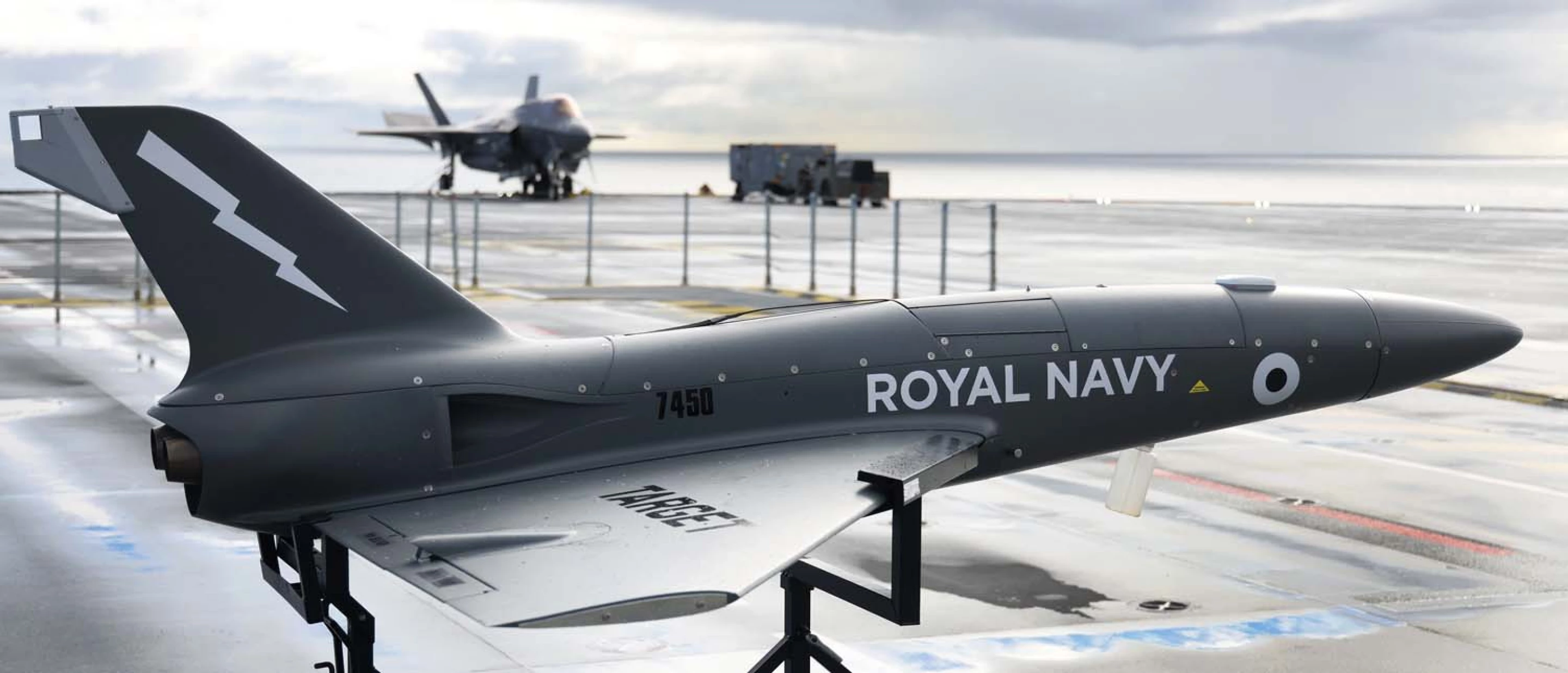 HMS Prince of Wales launches Banshee drones in fighter attack drill