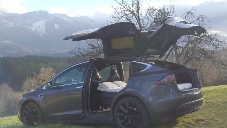 Dreamcase auto bed turns a Tesla into an electrified mini-campervan