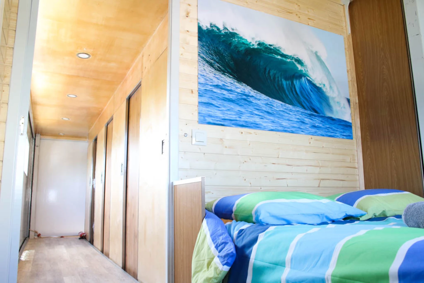 Double-decker motorhome hotel chases surf and sleeps you next to the beach