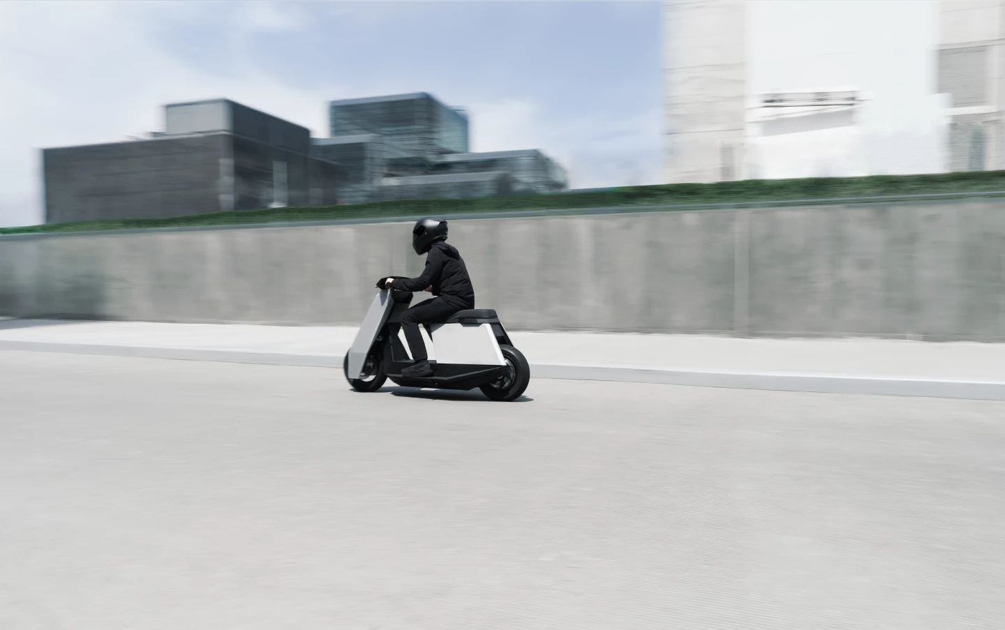 Sharp-angled electric scooter of the future cuts through city traffic