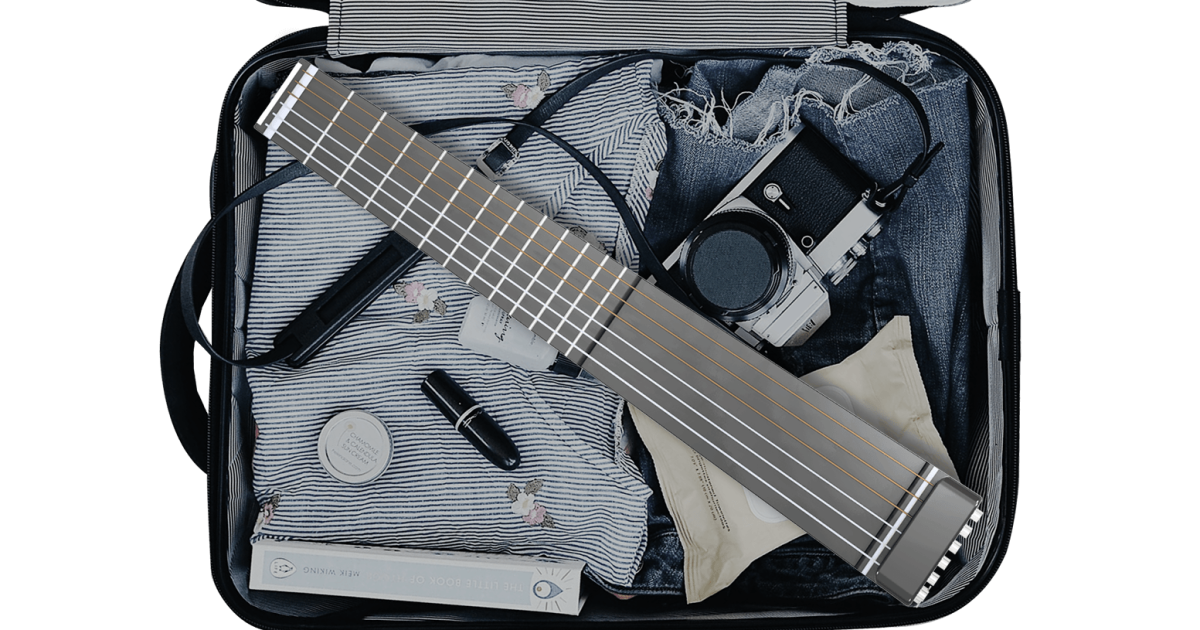Suitcase-friendly travel guitar built to sound like acoustics twice its ...