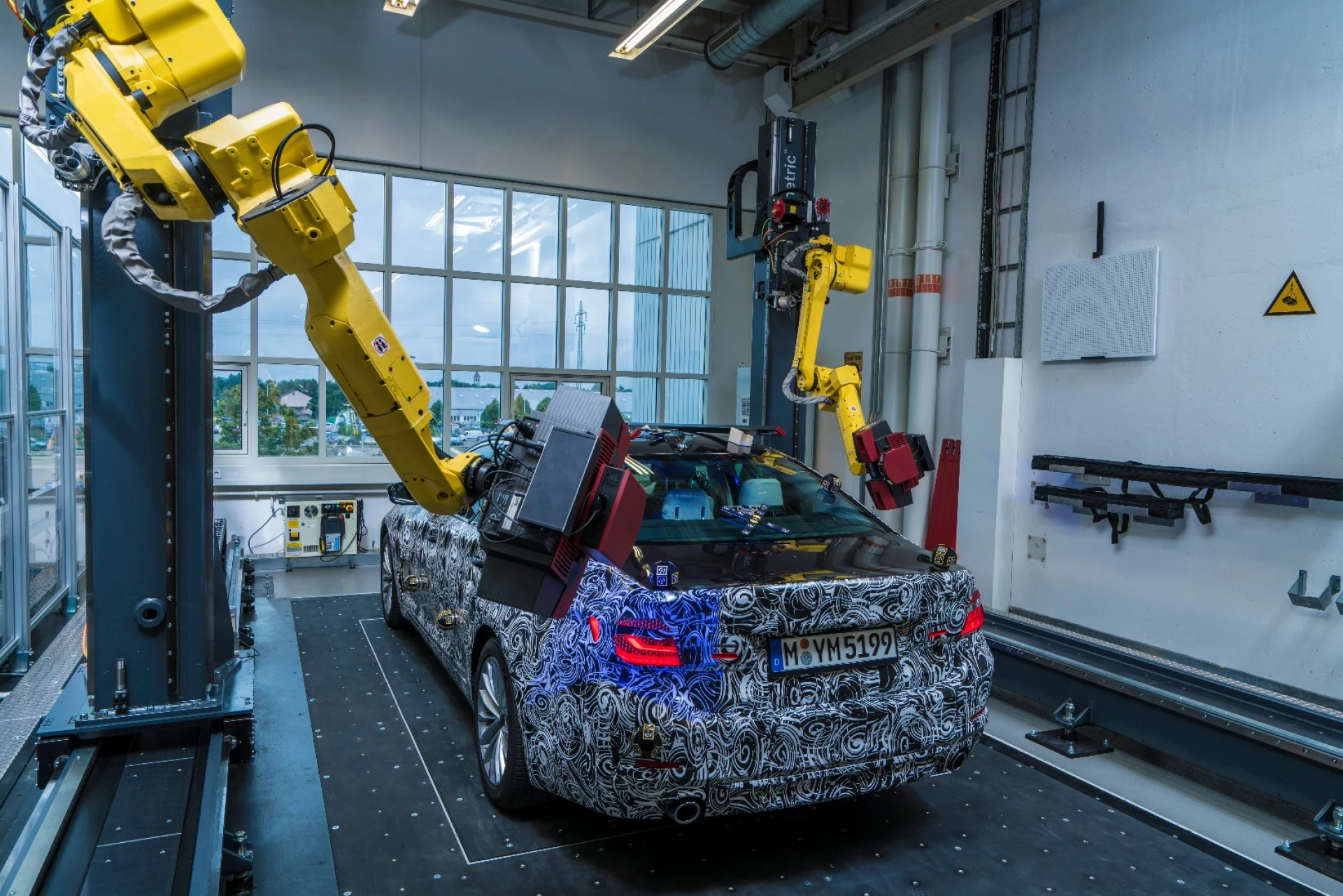 BMW is using faster robotic optical scanners to ensure its cars measure up