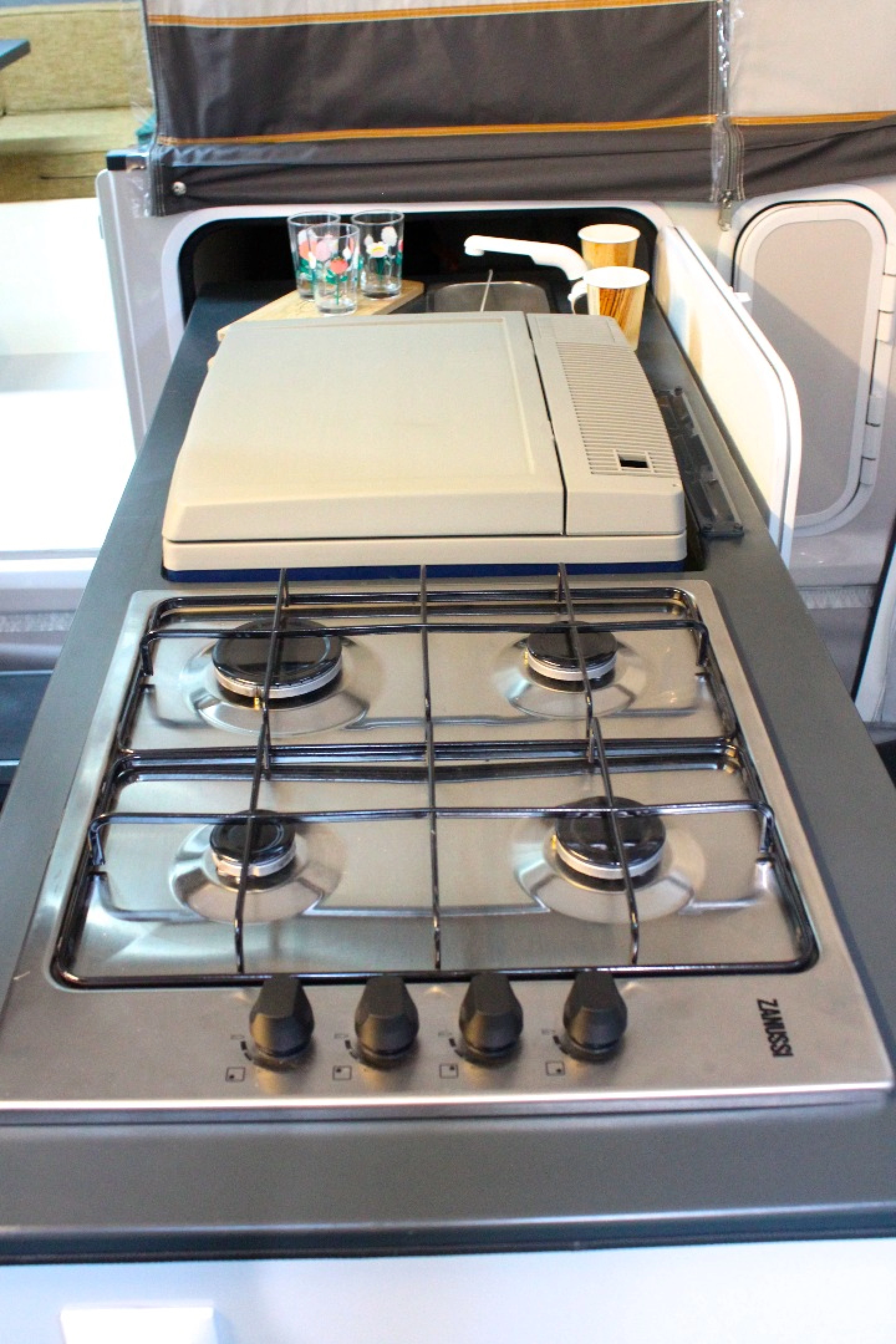 Remote-control pop-up camper tows like a sports car, grows into a ...