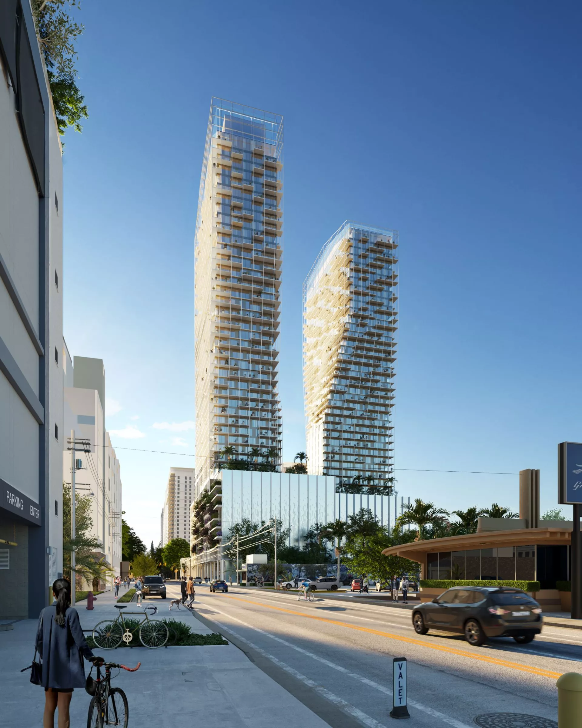 Pair of tapering towers defined by eye-catching exoskeleton exteriors