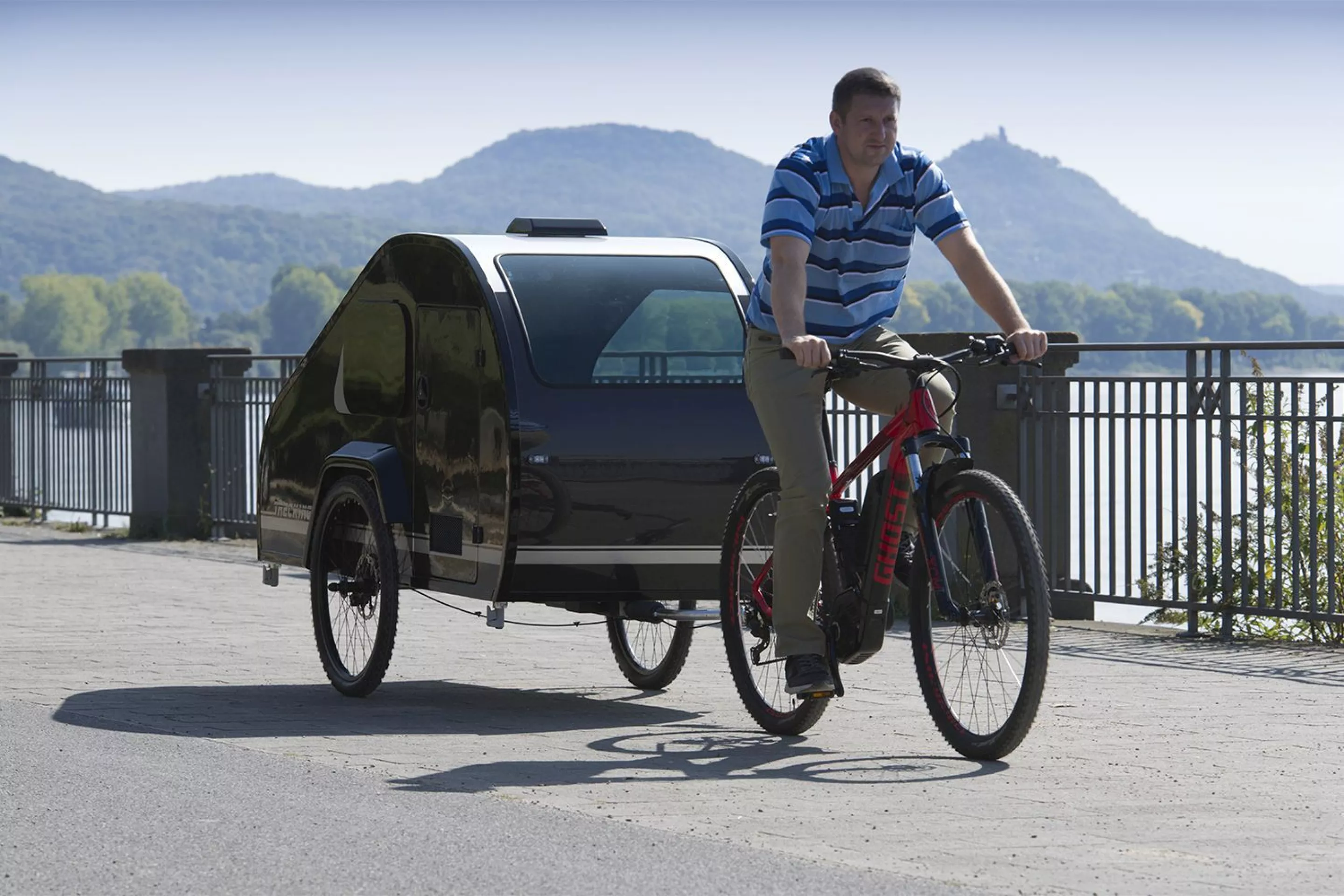 Fat-tire teardrop ebike camper explores the world via road and dirt