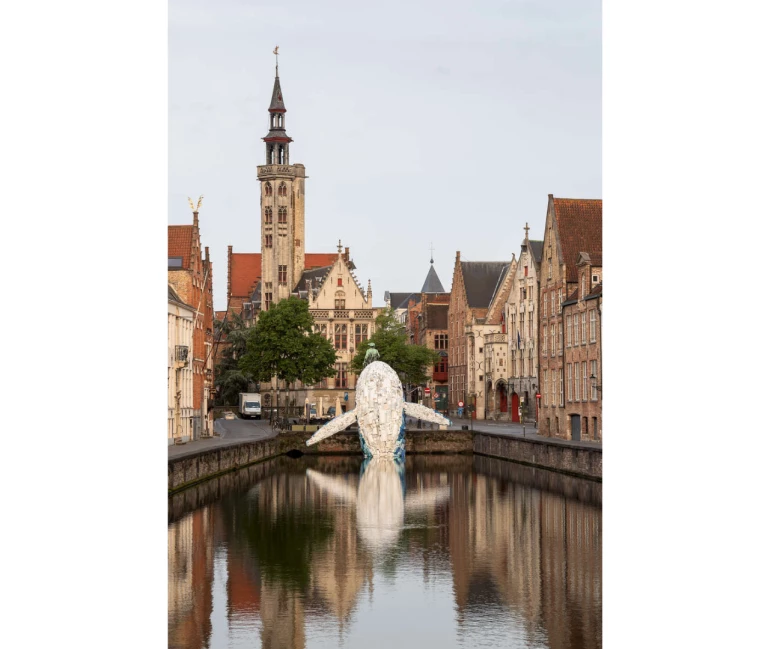 Whale made from plastic waste leaps out of canal