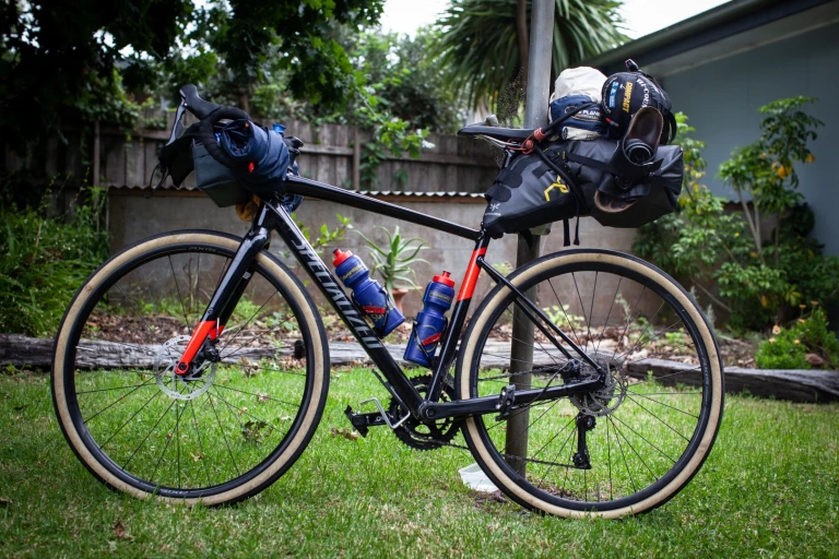 Bikepacking and bush-bashing through lush forest on Australia's ...