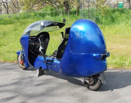 Electric-assist velomobile is dually driven