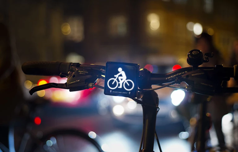 Attention-getting Brainy Bike Lights feature the "Sign of the Cyclist"