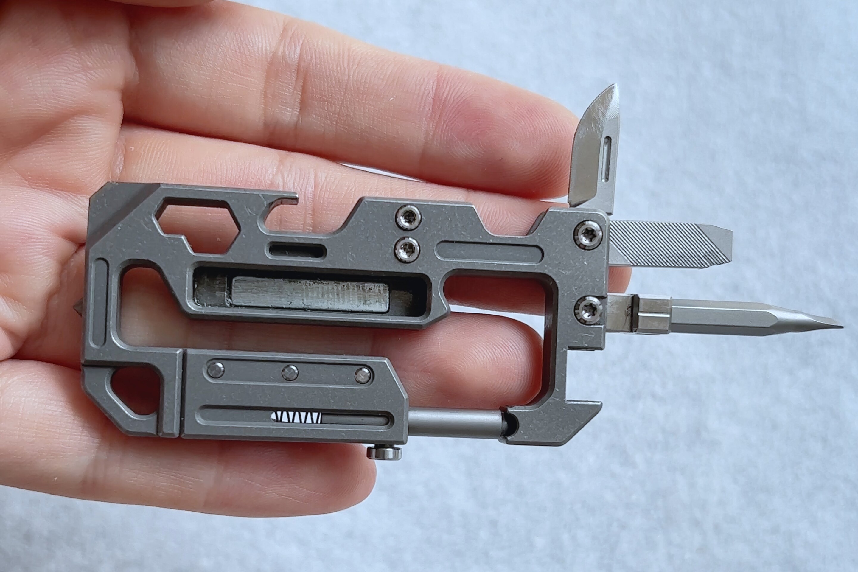 Tiny titanium multitool takes the "everyday carry" thing seriously
