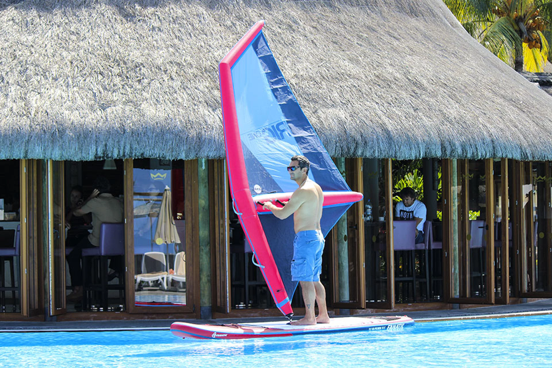Inflatable windsurfing rig sails on air ... and fits in a backpack