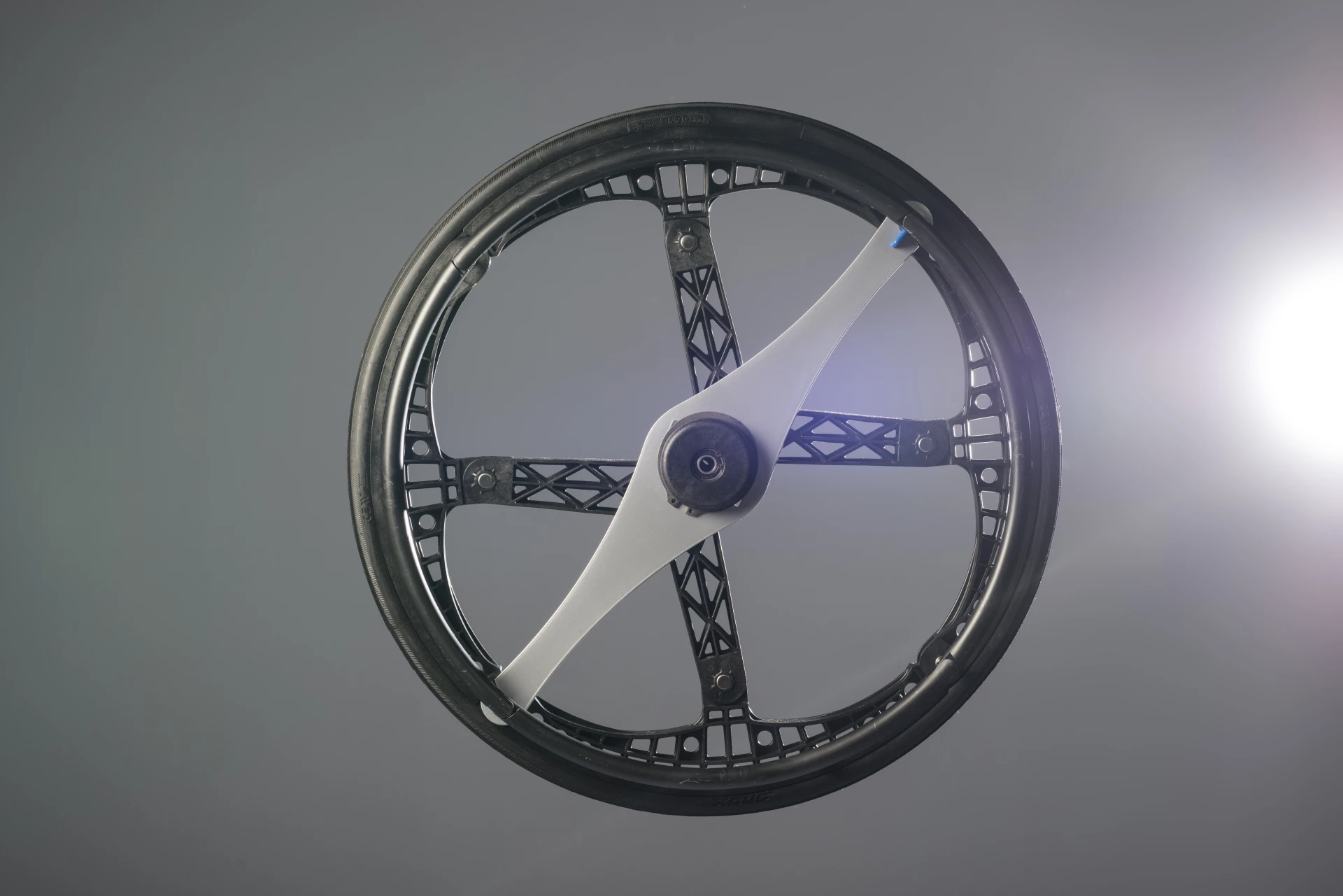 The Morph Wheel folds in half to make wheelchair travel easier