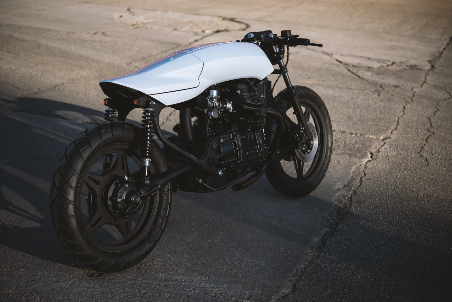Dotto's first custom motorcycle folds open like a Swiss Army knife