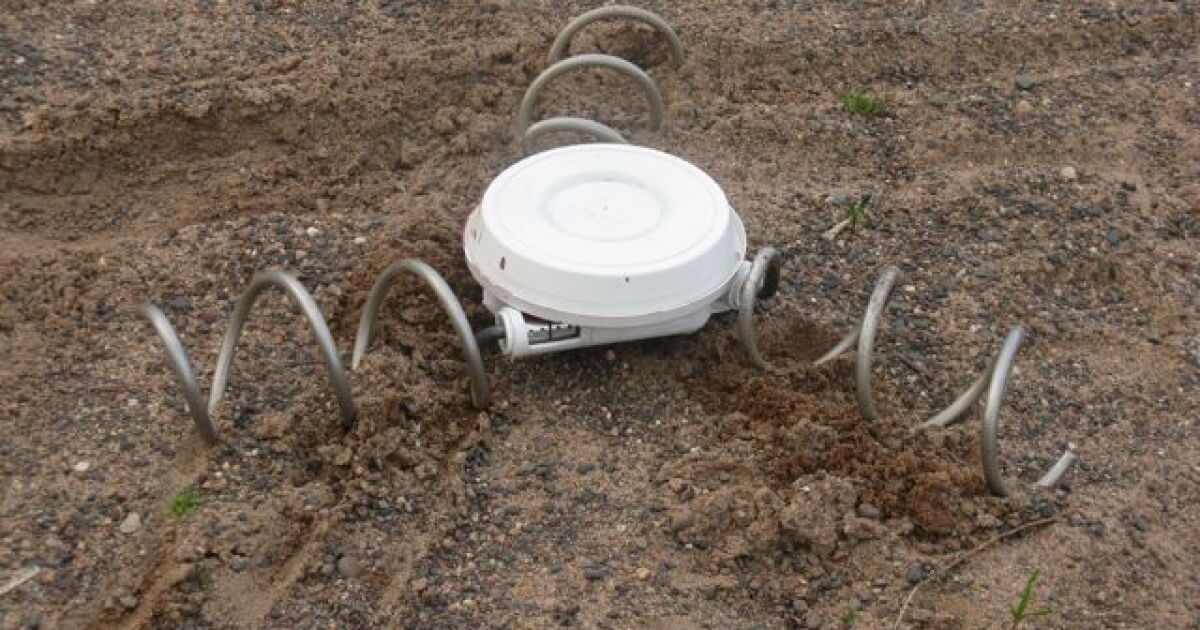 Robot rover tackles uneven ground using screw drive