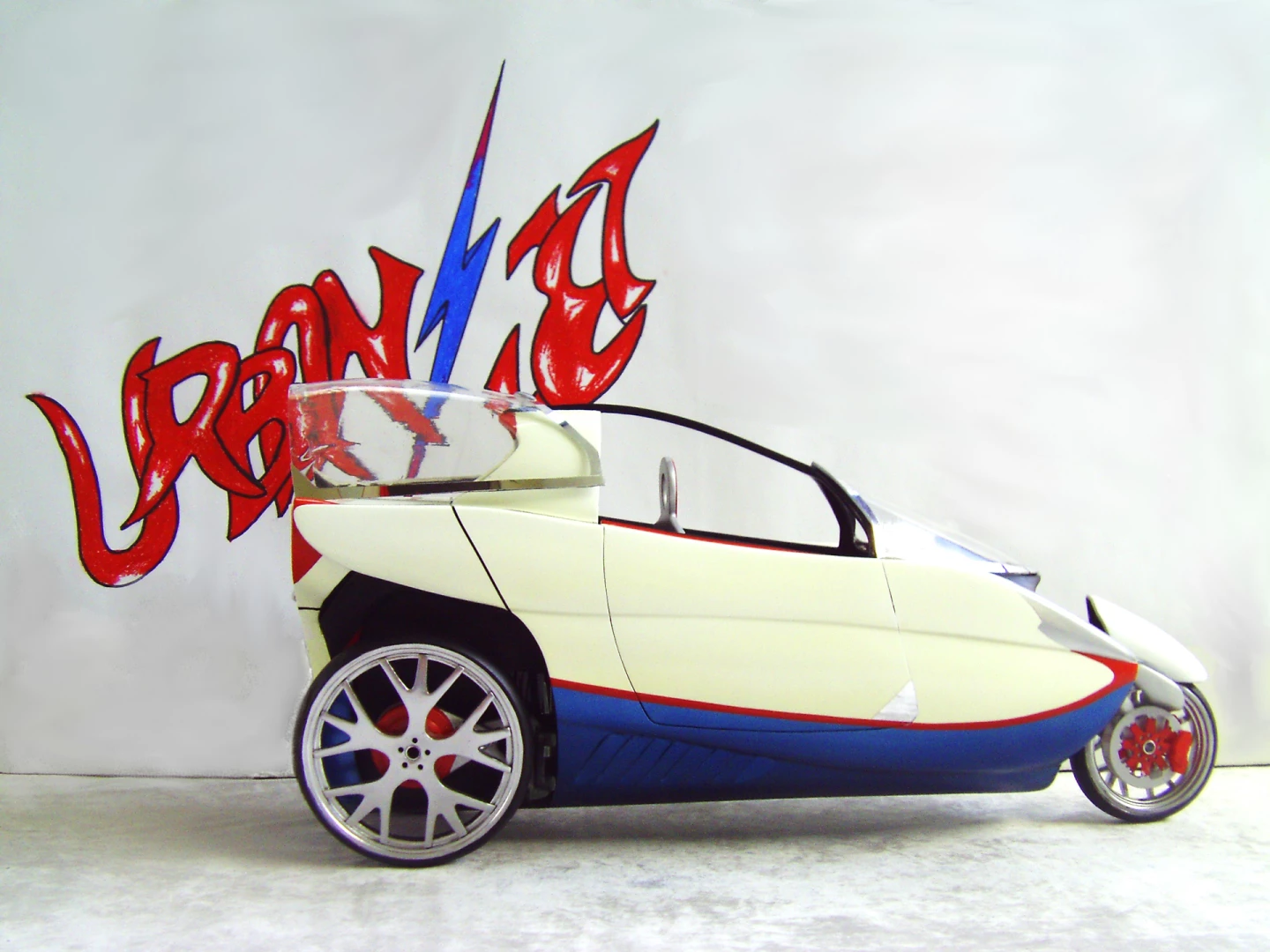 Tilting 'bullet-proof’ 150mph 3-wheel EV … Urban Jet or urban myth?