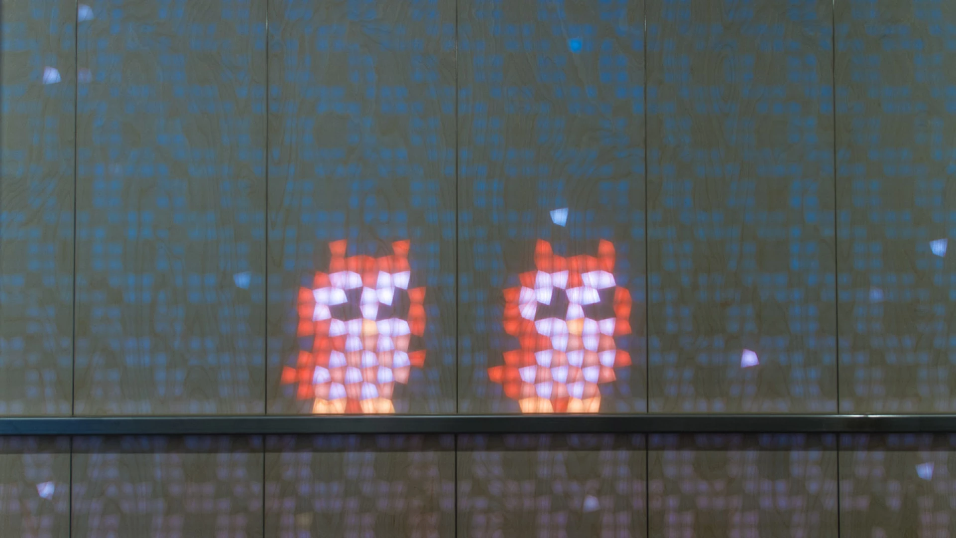 Motion-sensing wall panels animate boring interiors